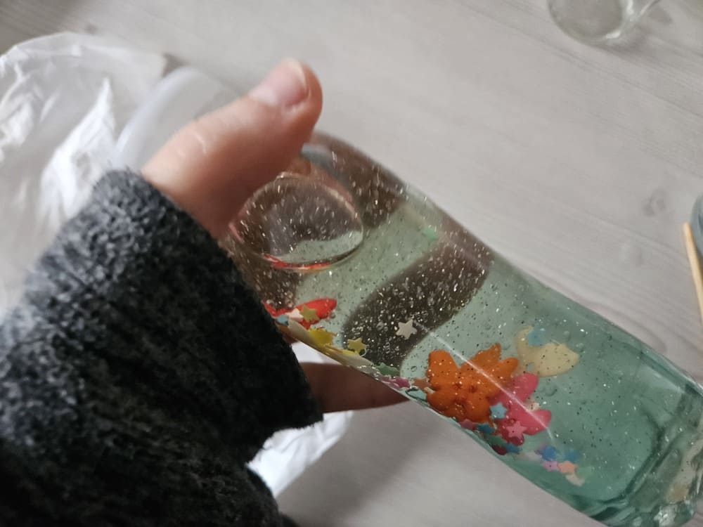 A Vegetable Oil And Water Spring Sensory Bottle -Easy Mixing Fun